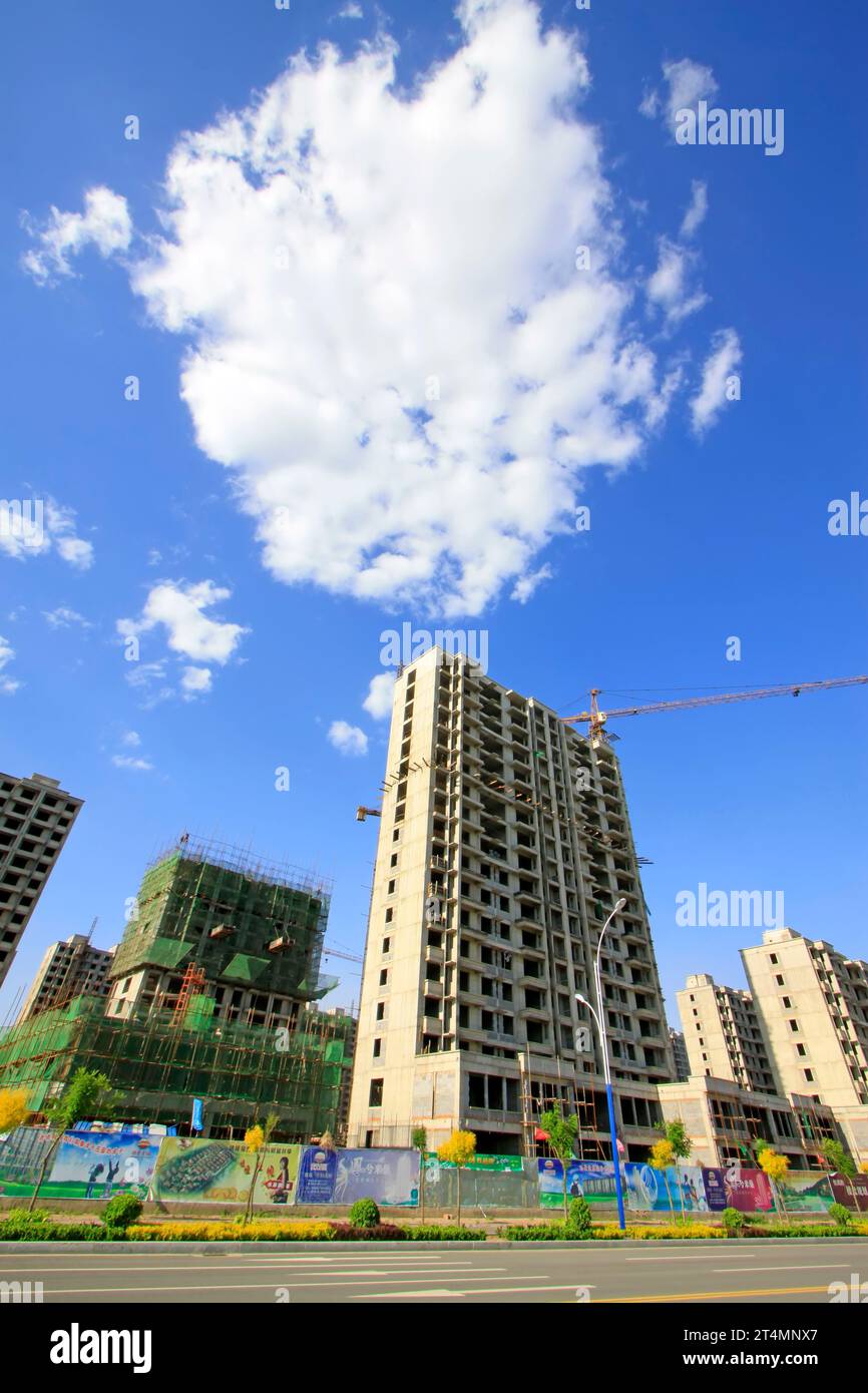 Unfinished high-rise buildings in the city, closeup of photo Stock ...