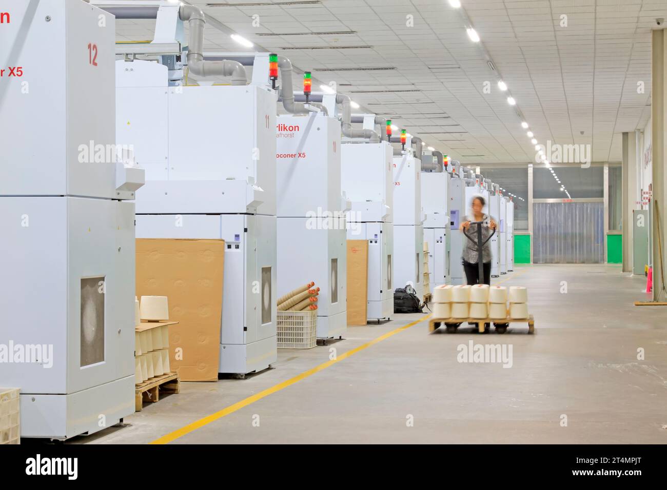 Workers in spacious factory workshop hi-res stock photography and ...