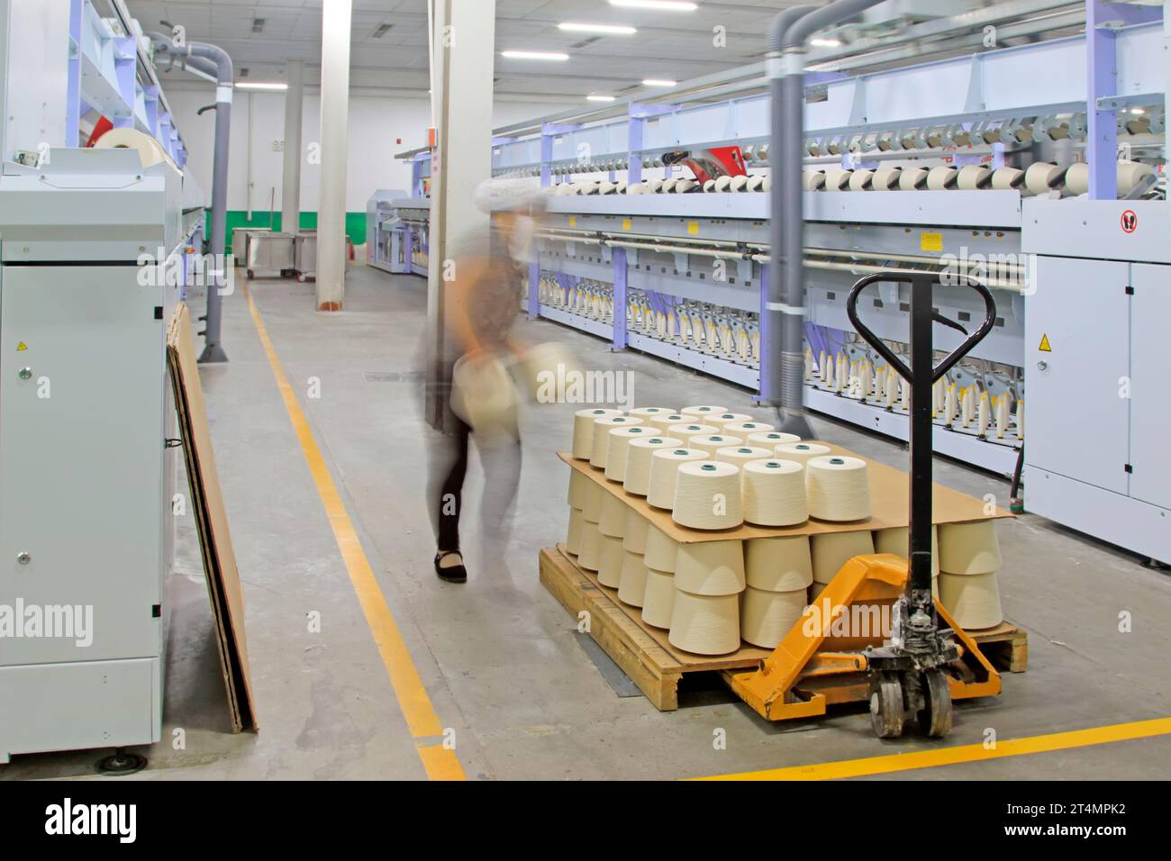 Workers in spacious factory workshop hi-res stock photography and ...