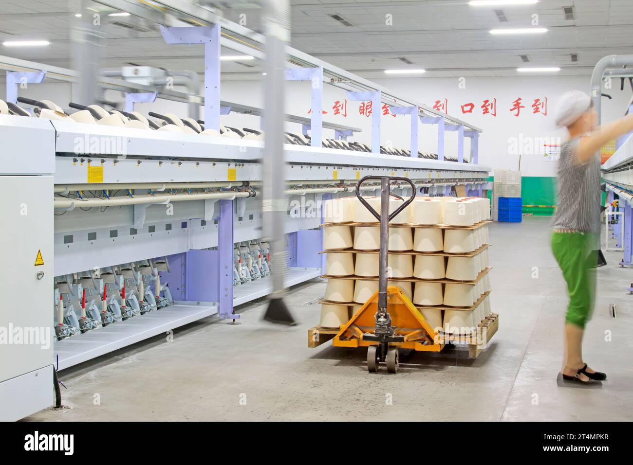 Workers in spacious factory workshop hi-res stock photography and ...