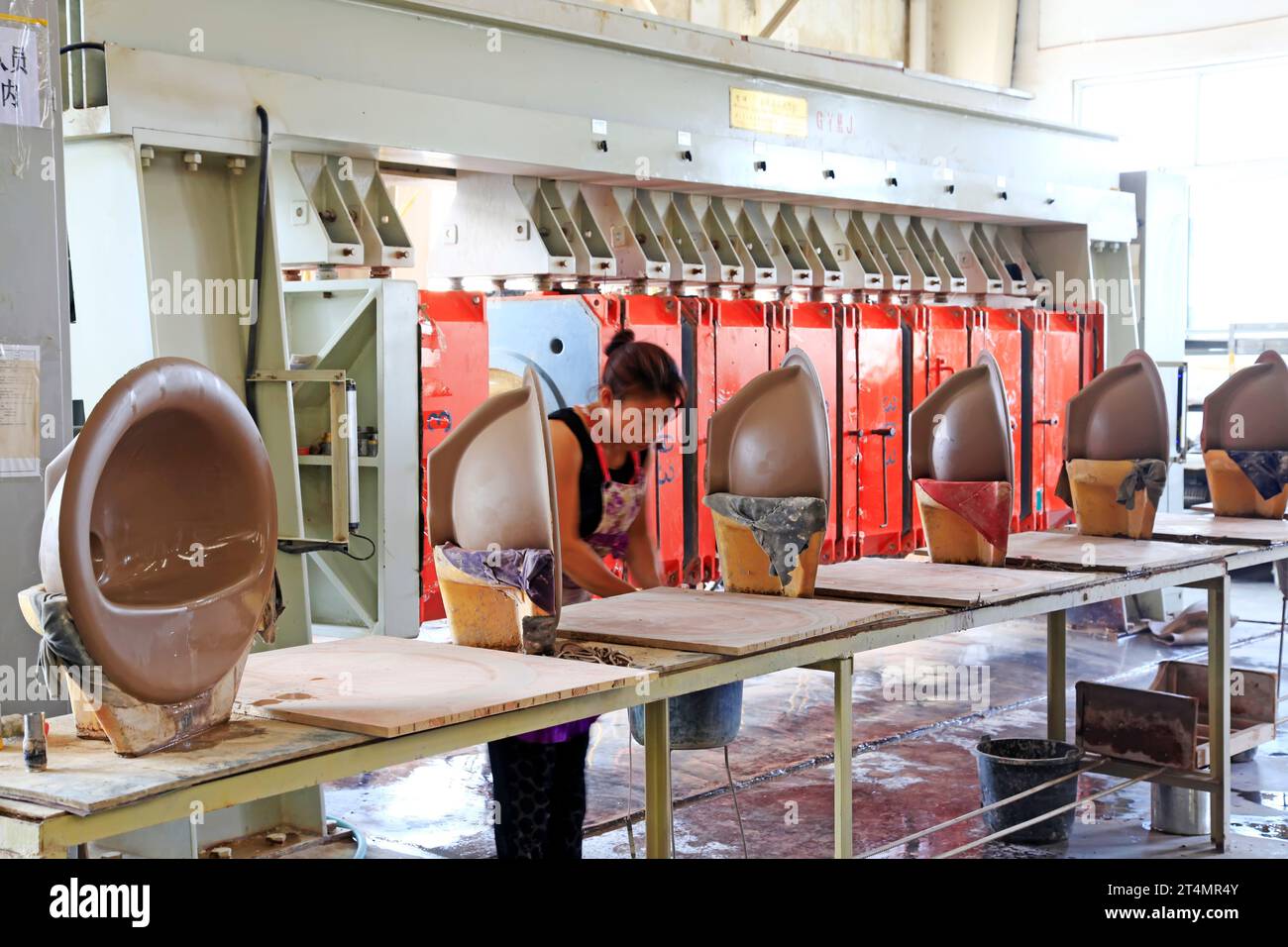 ceramic molding workshop production line in a factory, closeup of photo ...