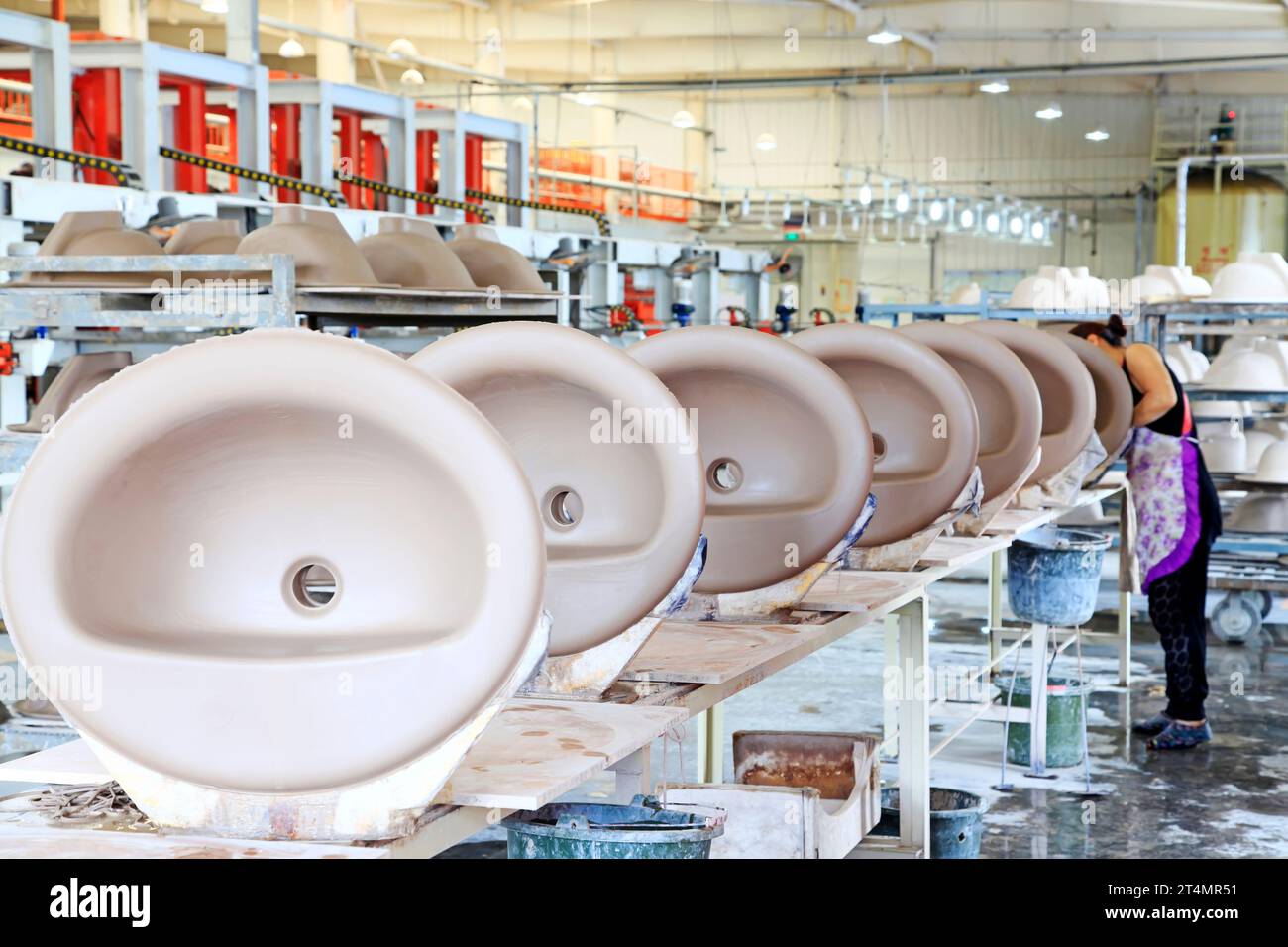 ceramic molding workshop production line in a factory, closeup of photo ...