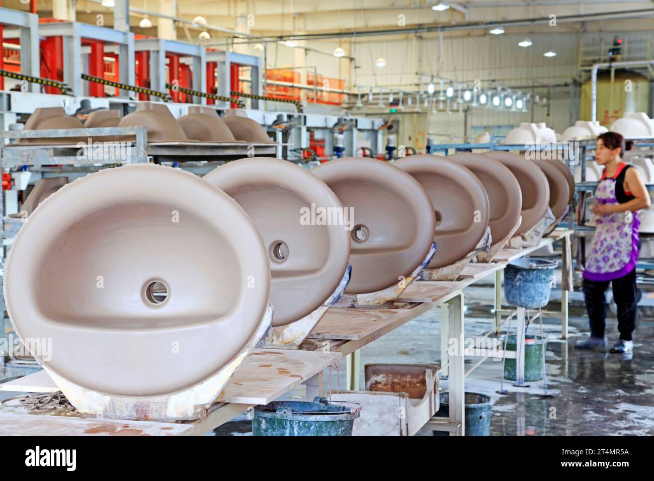 ceramic molding workshop production line in a factory, closeup of photo ...
