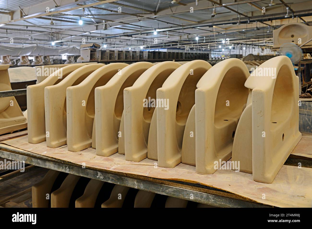 Ceramic semi-finished products on the production line in a factory ...