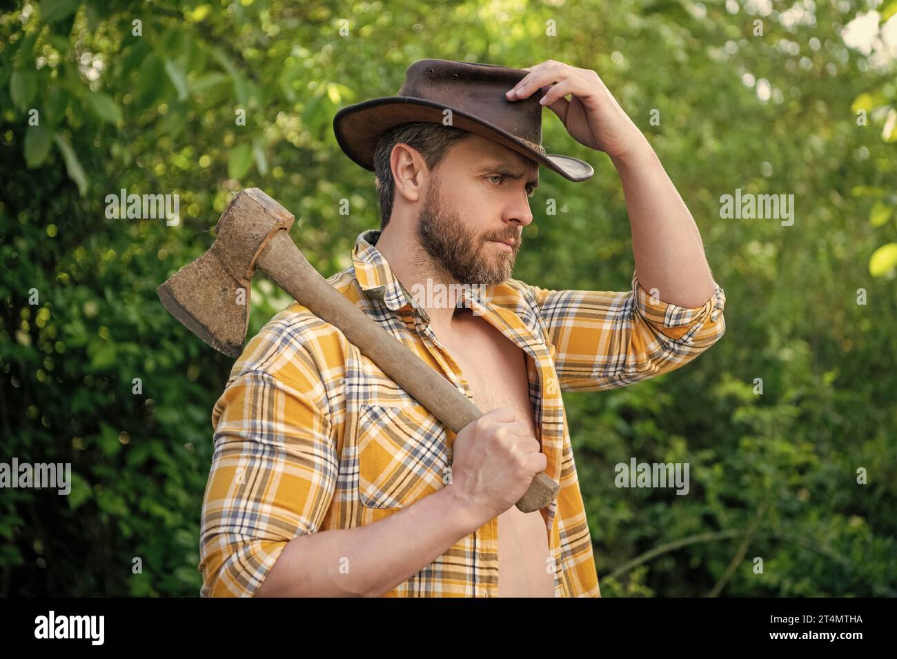 cowboy with axe outdoor. photo of cowboy with axe. cowboy with axe ...