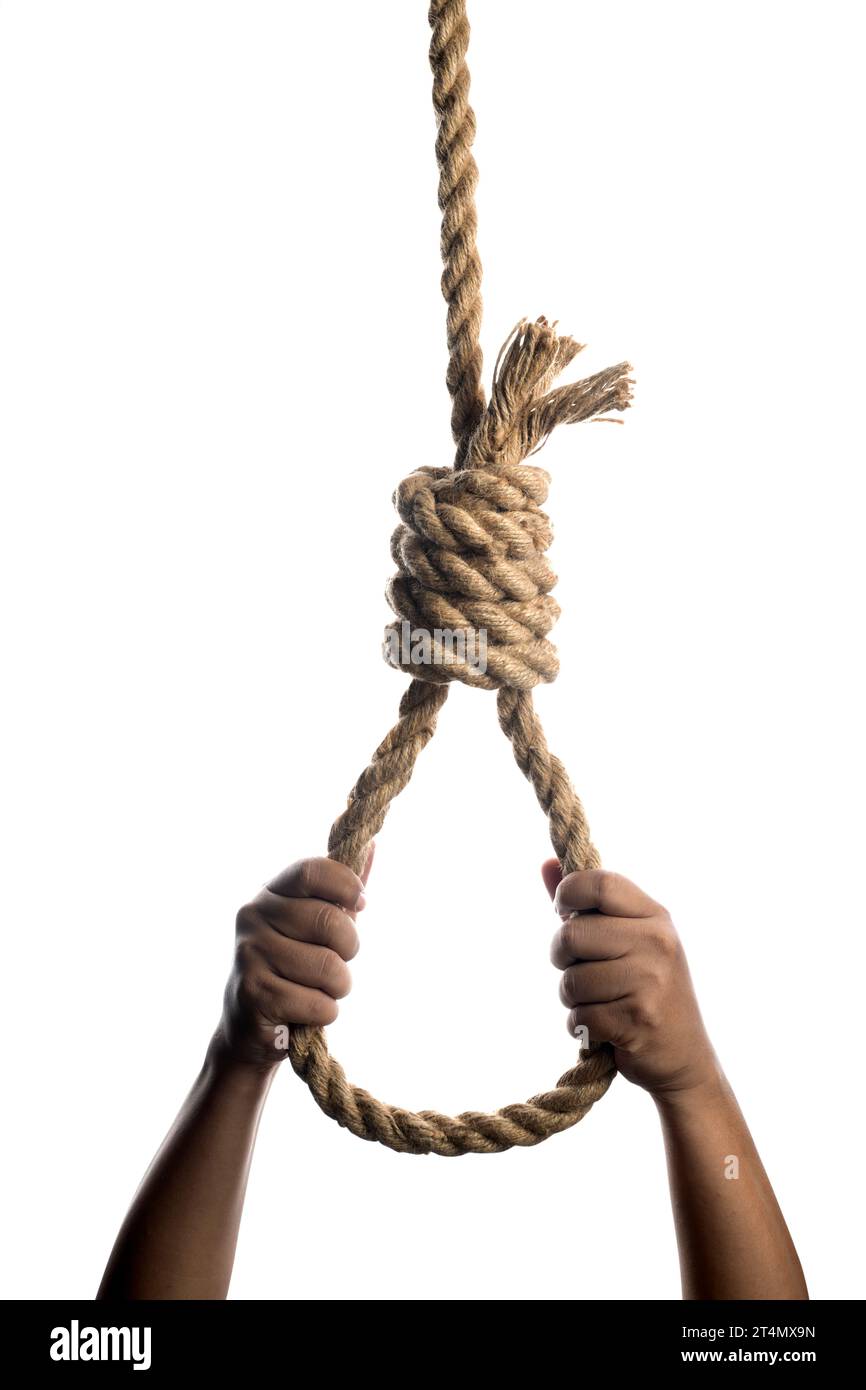 Man hand holding rope with a hangman noose knot isolated over a white ...