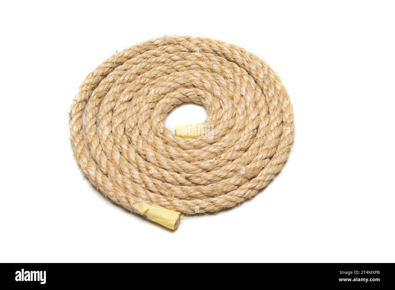 Coiled rope isolated over a white background Stock Photo - Alamy