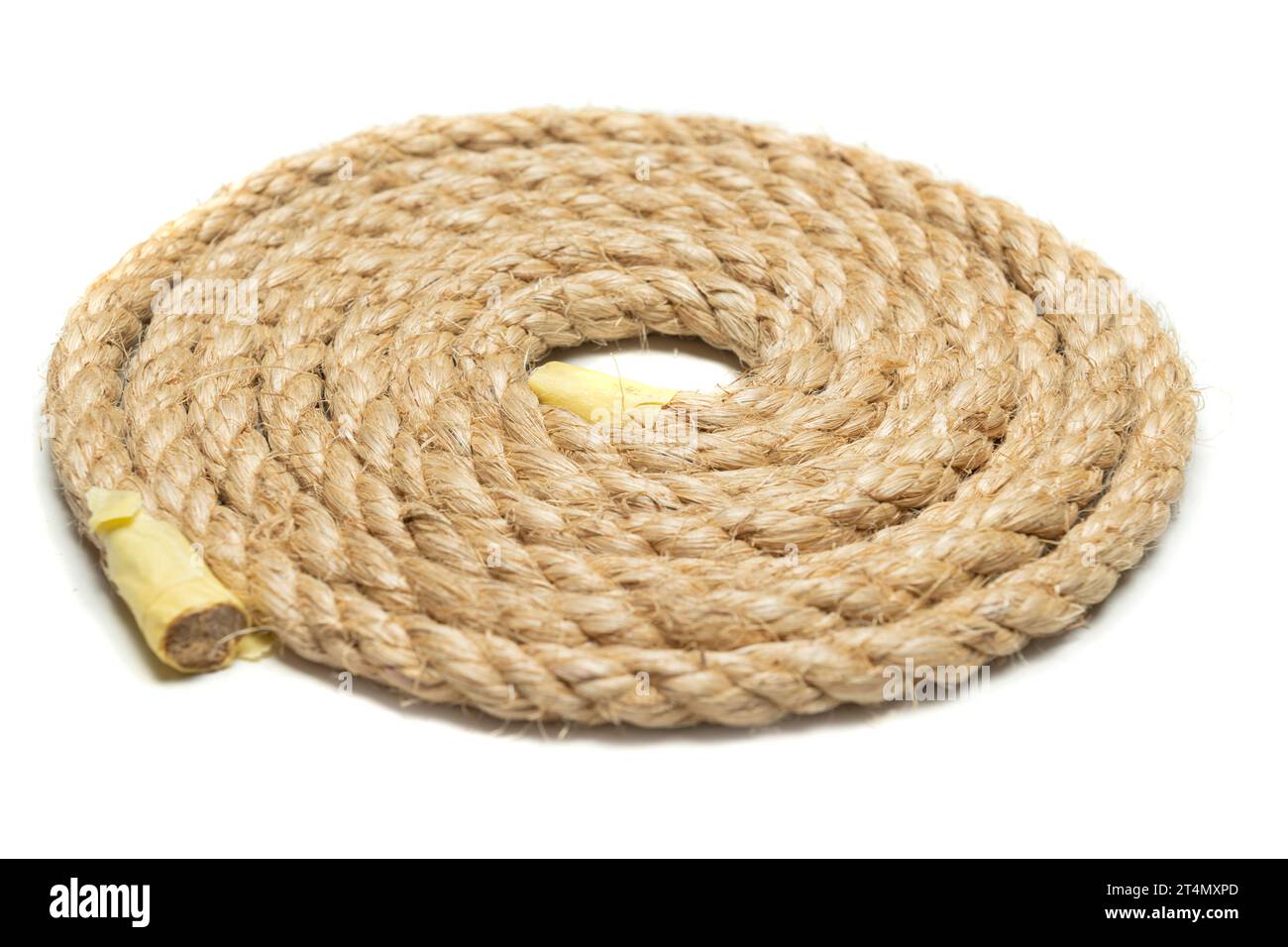 Coiled rope isolated over a white background Stock Photo - Alamy