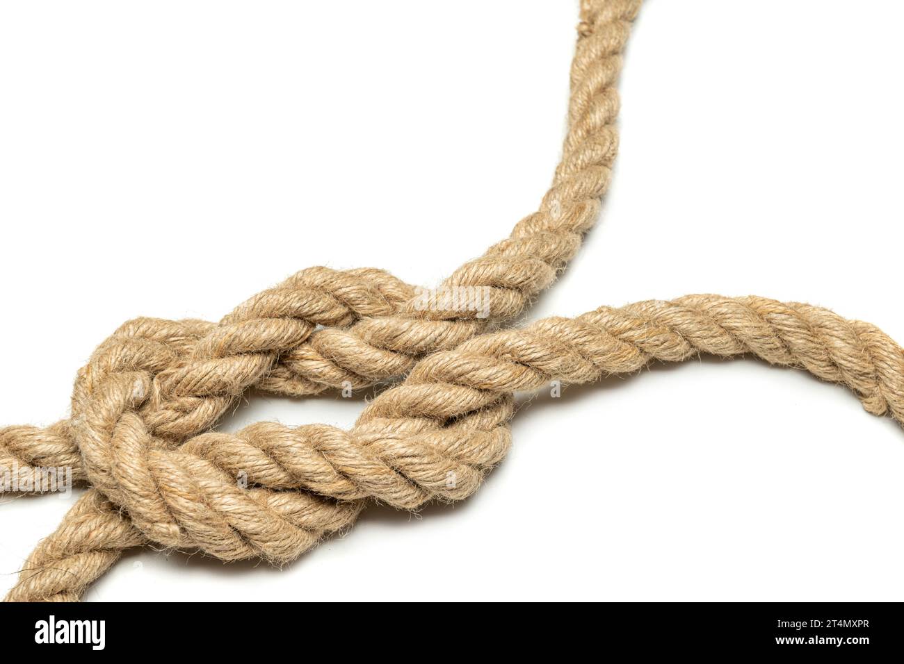 Coiled rope knot isolated over a white background Stock Photo - Alamy