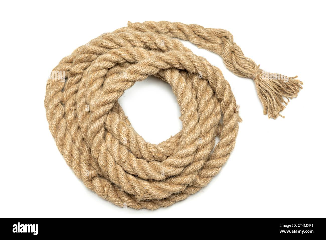 Coiled rope isolated over a white background Stock Photo - Alamy