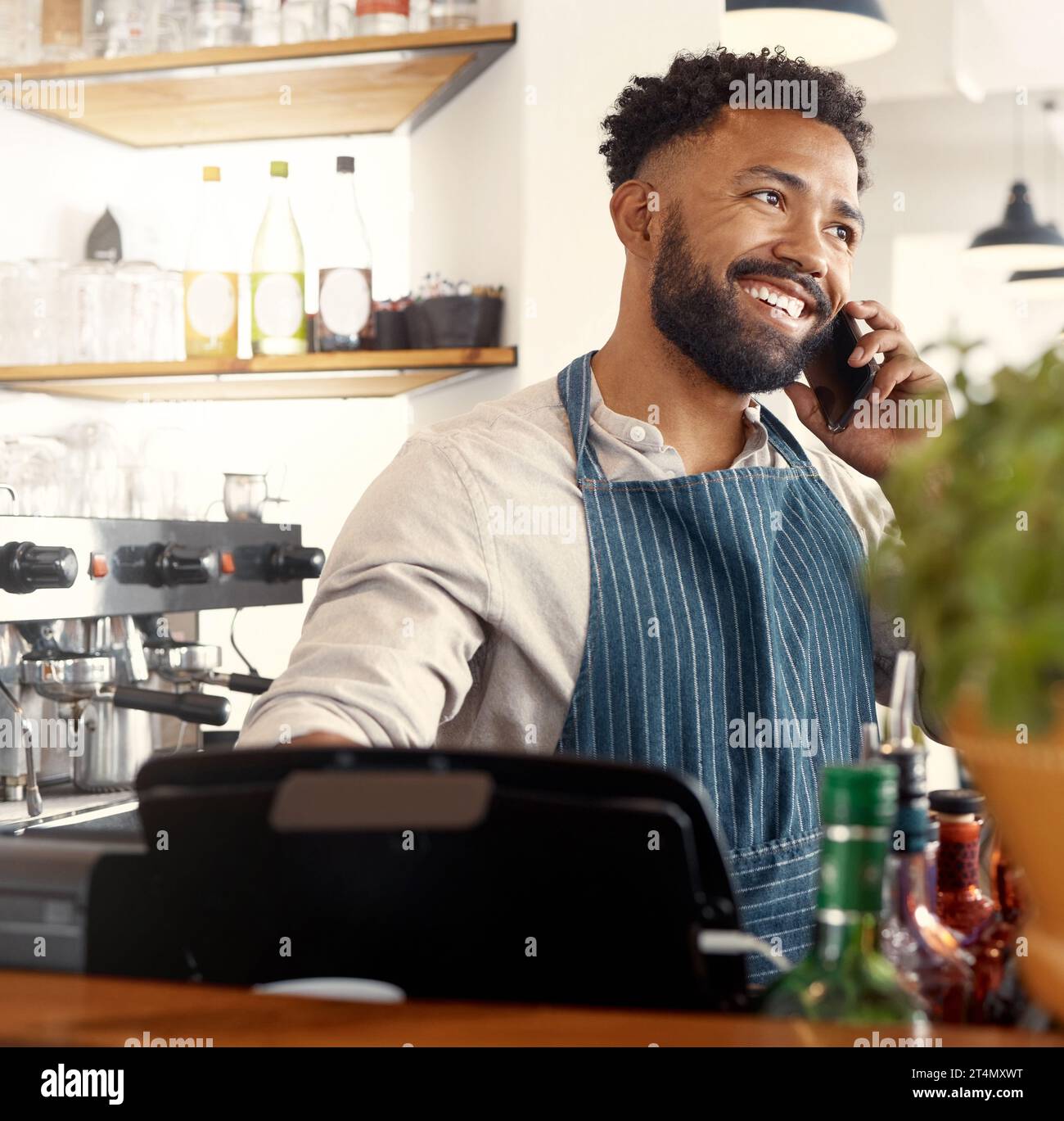 Placing orders has never been easier. a young waiter taking an order ...