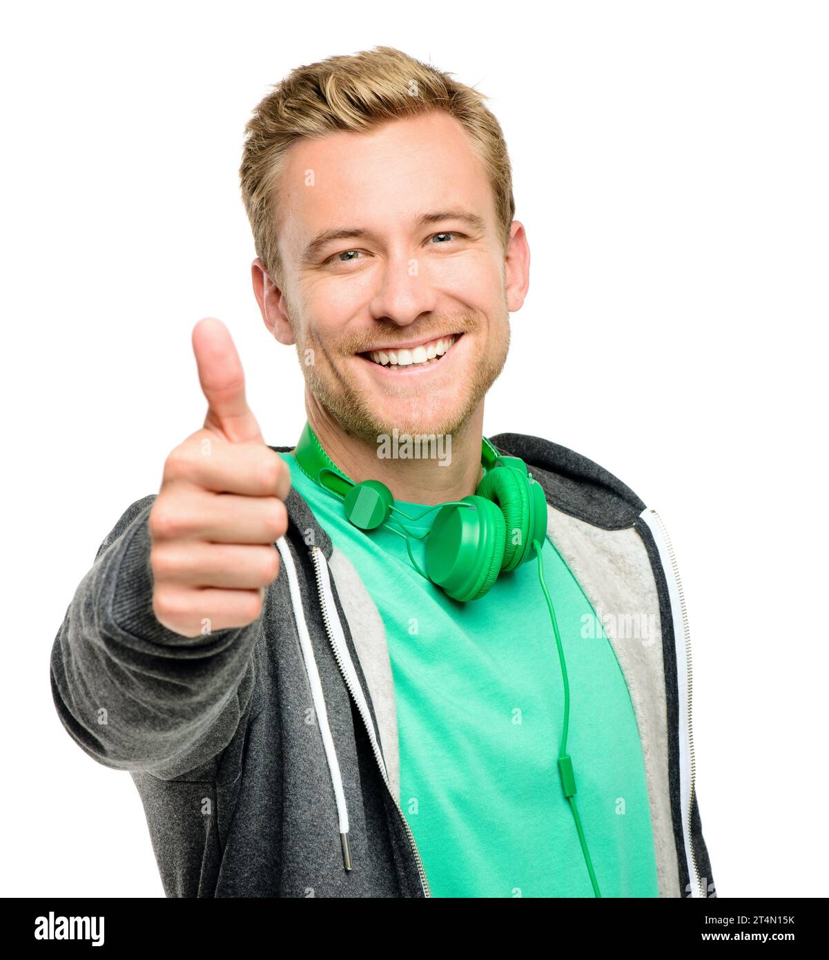 Youre doing great. a handsome young man standing alone in the studio ...