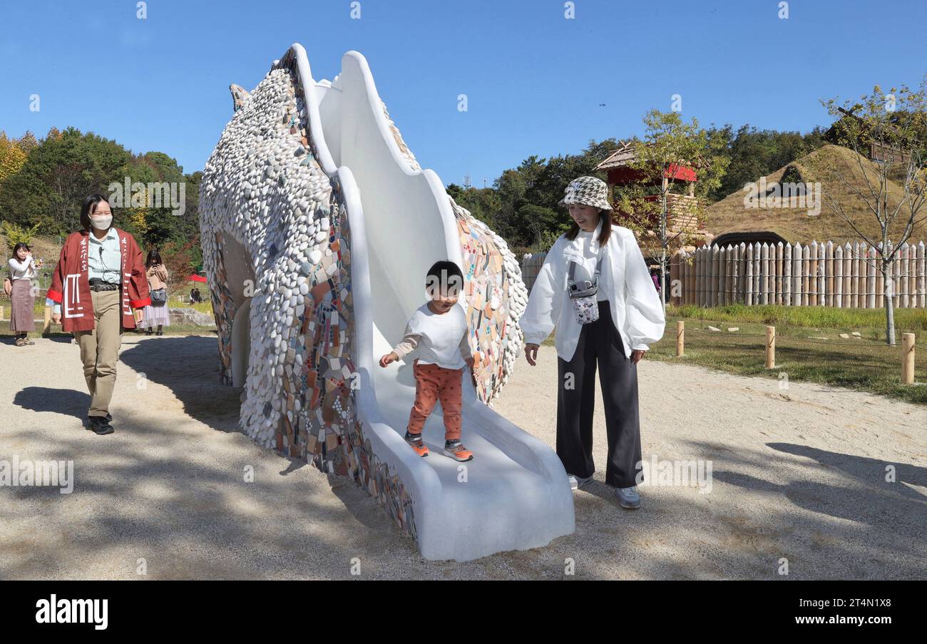 People visit the Mononoke Village area at Ghibli Park in Nagakute, Aich ...