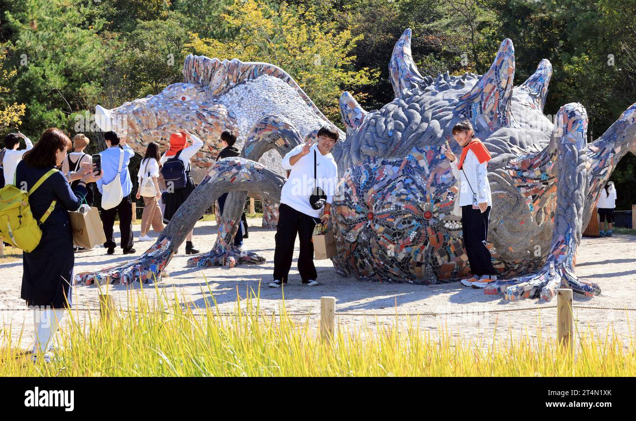 People visit the Mononoke Village area at Ghibli Park in Nagakute, Aich ...