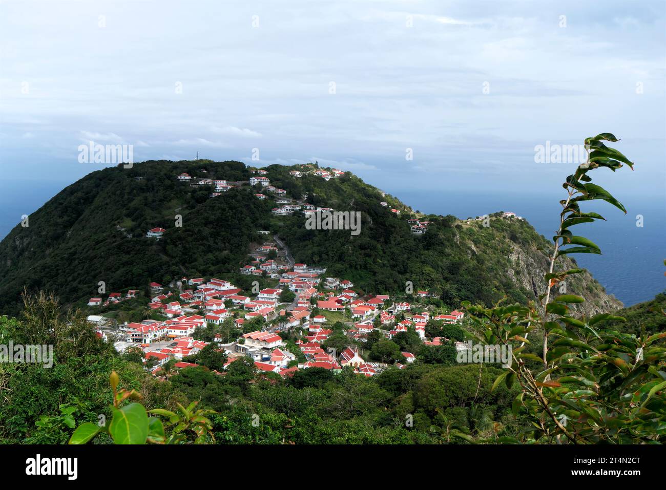 The red rooftops of the village Windward Side in Saba, Dutch Caribbean ...