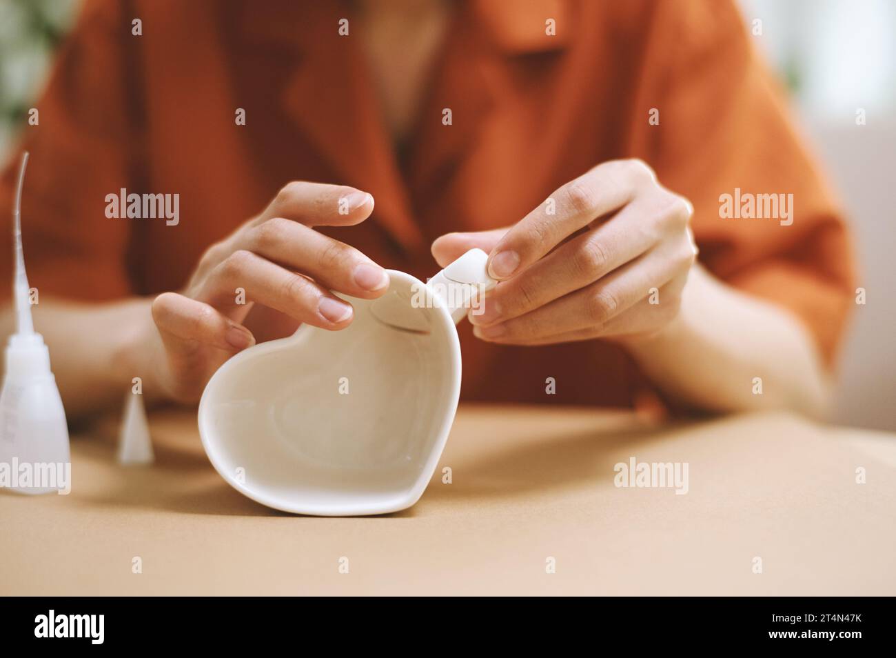 Broken ceramic heart hi-res stock photography and images - Alamy