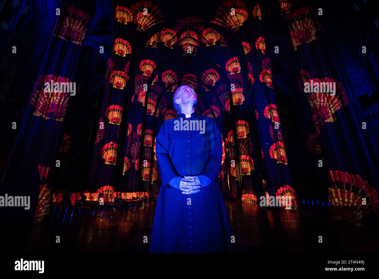 Reverand Nic Harris looks at the lights in Bristol cathedral during ...