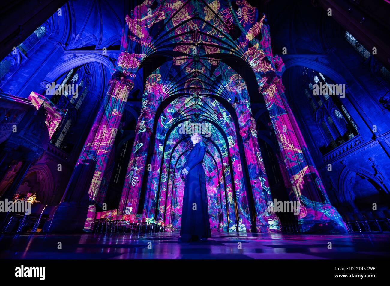 Reverand Nic Harris looks at the lights in Bristol cathedral during ...