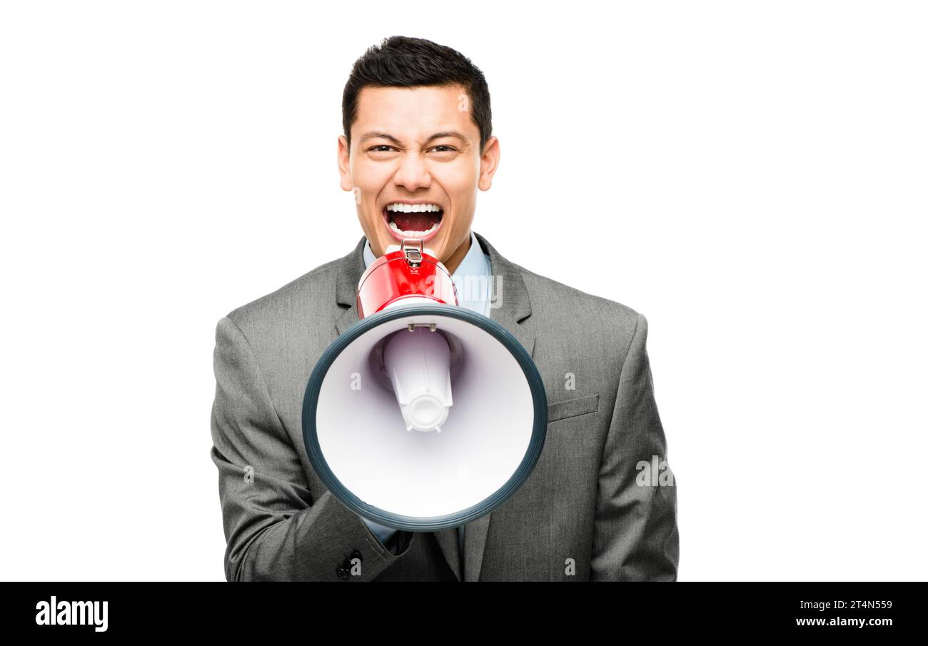 Getting his message across. an asian businessman shouting into a ...
