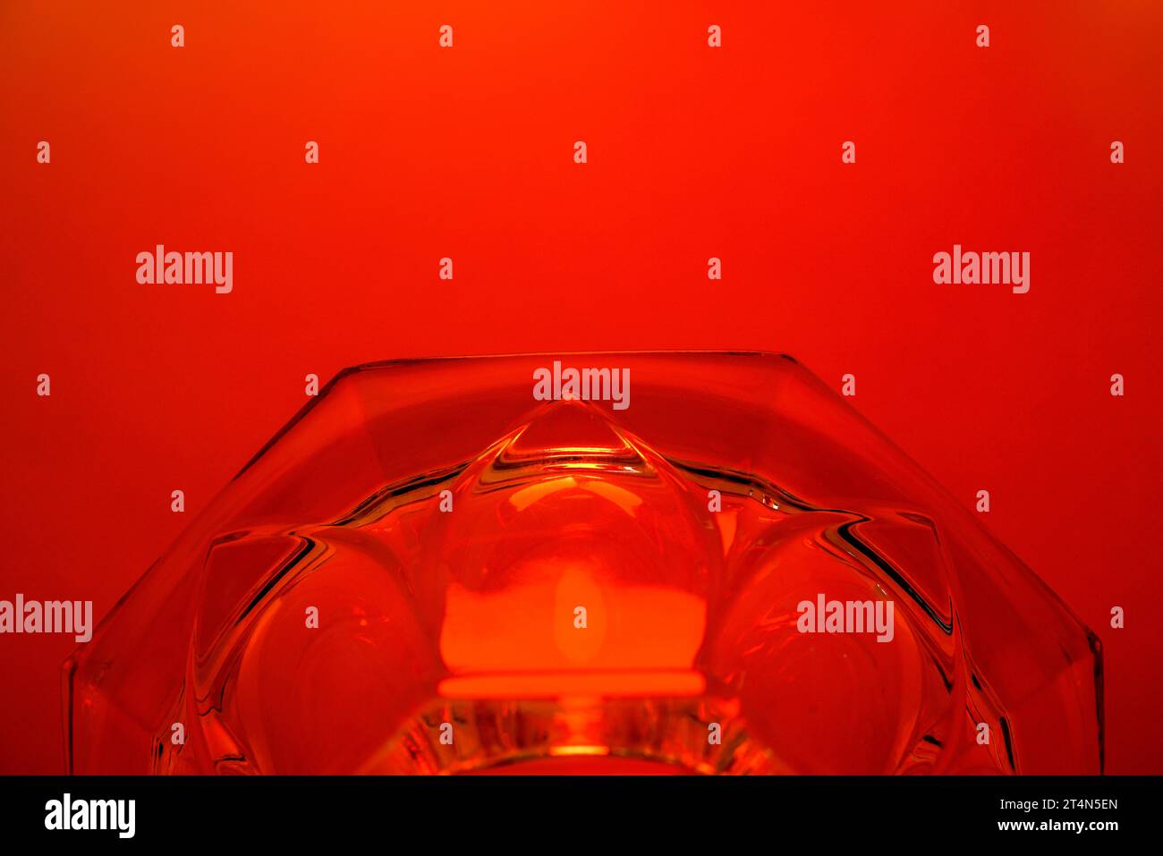 Red solid color background with light pattern as photo Stock Photo - Alamy