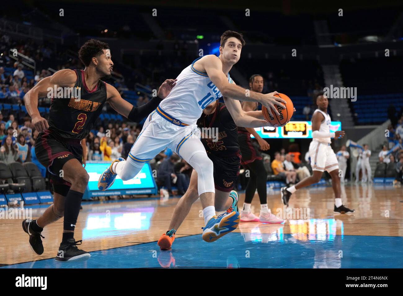 UCLA Bruins guard Lazar Stefanovic (10) is defended by Cal State ...