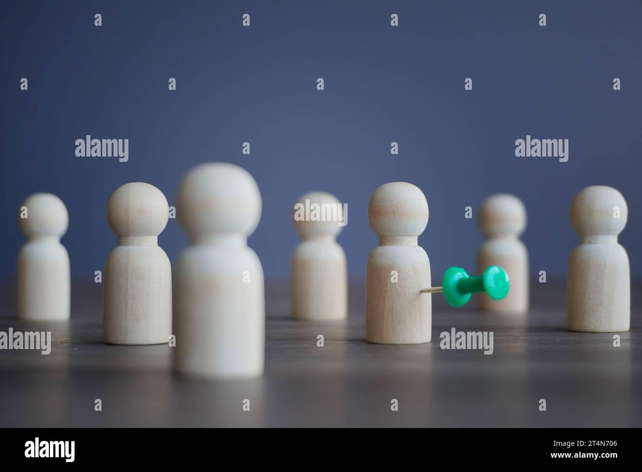 Wooden dolls and pushpin. Target customer, target market and potential ...