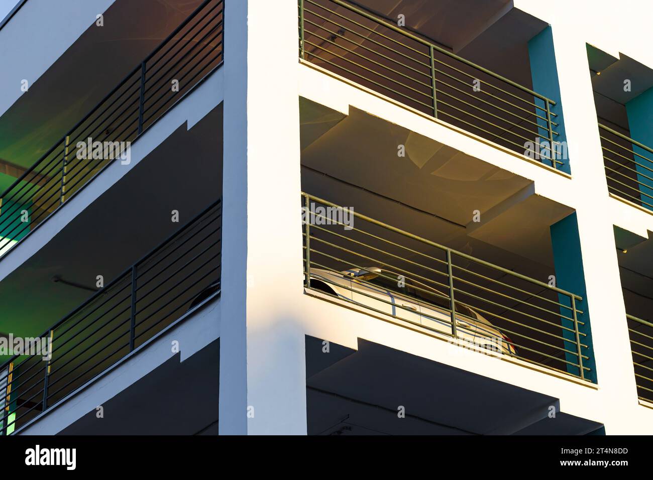 multi-level car parking shot from below. car parking in a tall building ...