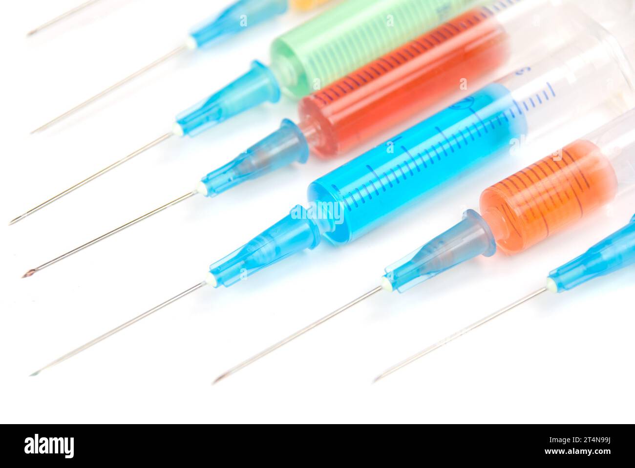 Syringes with different color medicines Stock Photo - Alamy