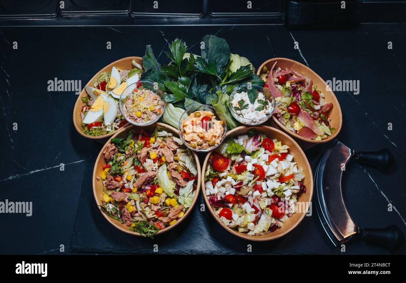 Different types of salads in a bowl on a table in a restaurant Stock ...