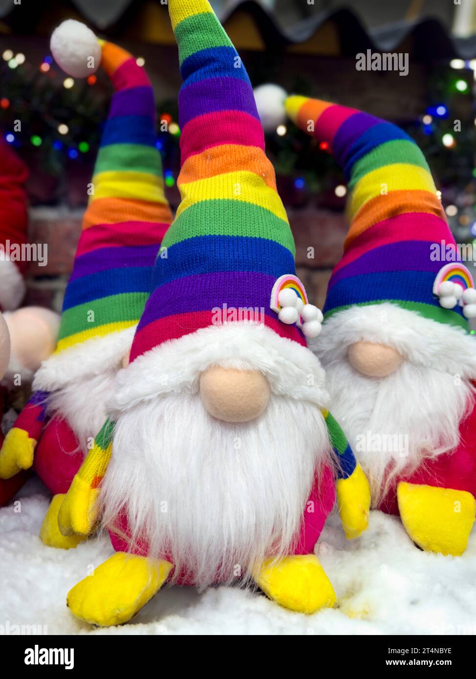 Rainbow Christmas Gonks on a Snowy background Stock Photo - Alamy