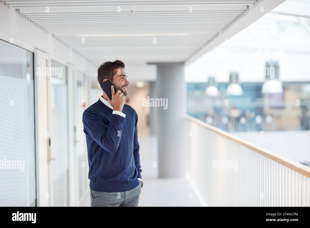 Stepping out to make a follow-up call with a client. a young ...