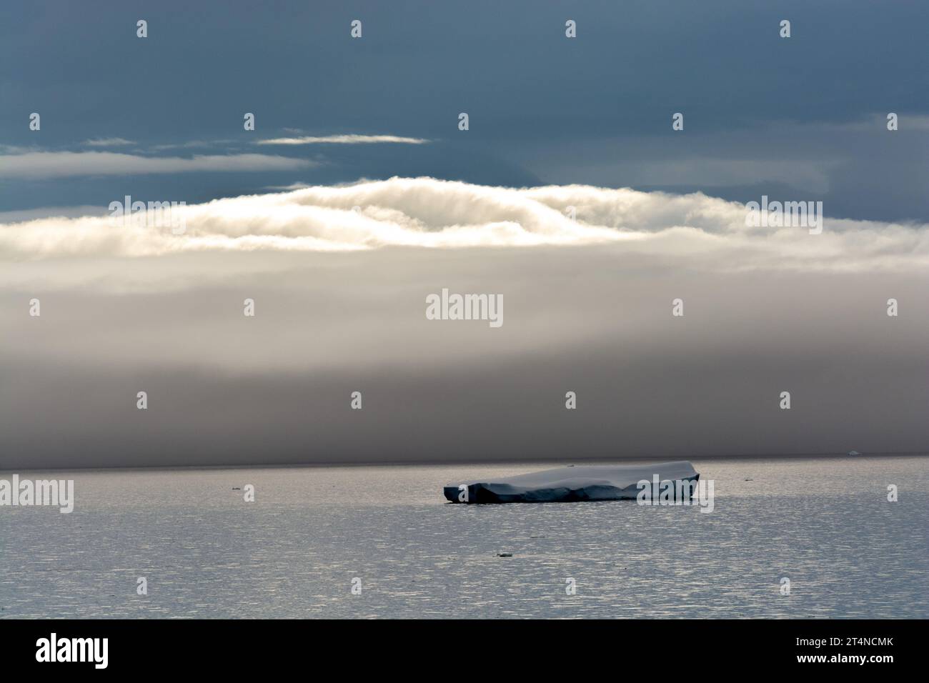 iceberg in front of low cloud covering icy waters near hope bay ...