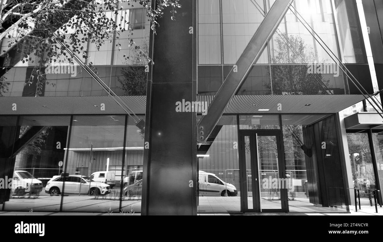 Combination of metal and glass wall material. Steel facade on columns ...