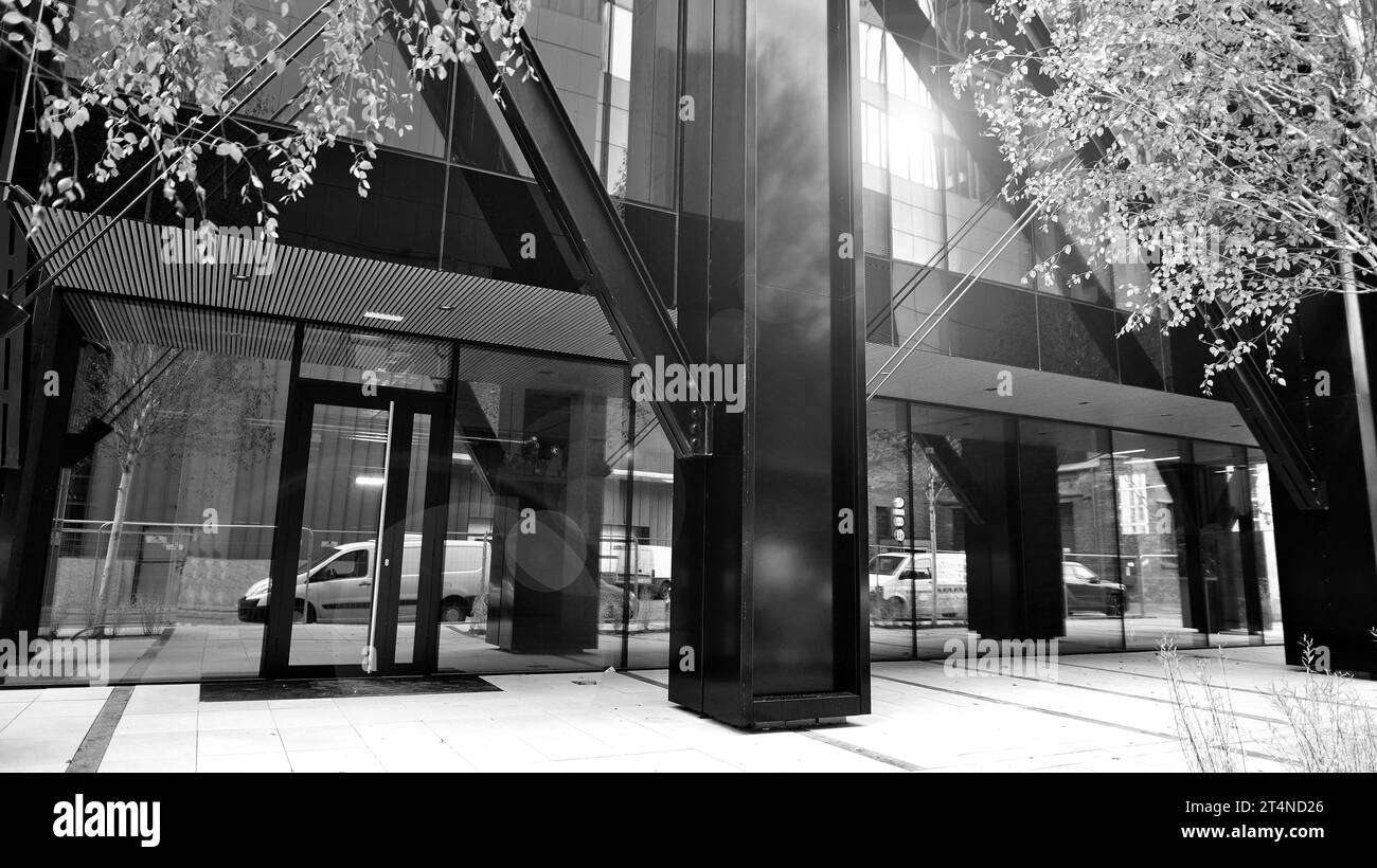 Combination of metal and glass wall material. Steel facade on columns ...