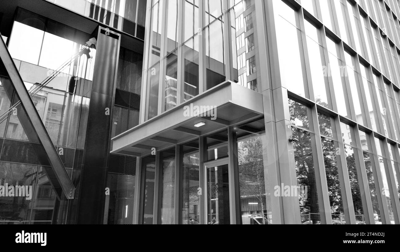 Combination of metal and glass wall material. Steel facade on columns ...