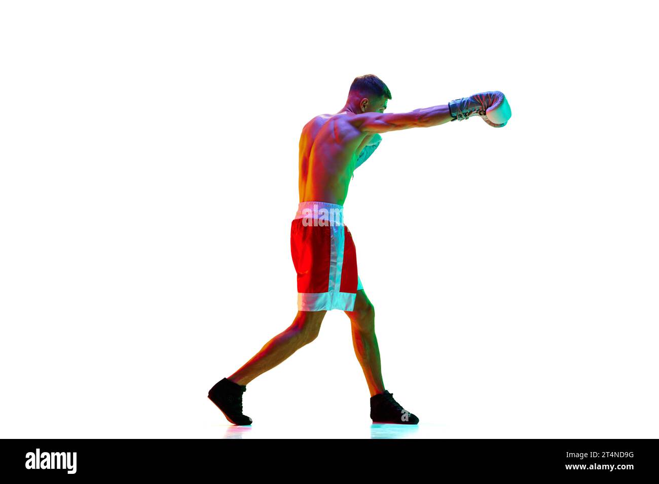 Side view. Energetic professional male boxer, mixed martial art fighter ...