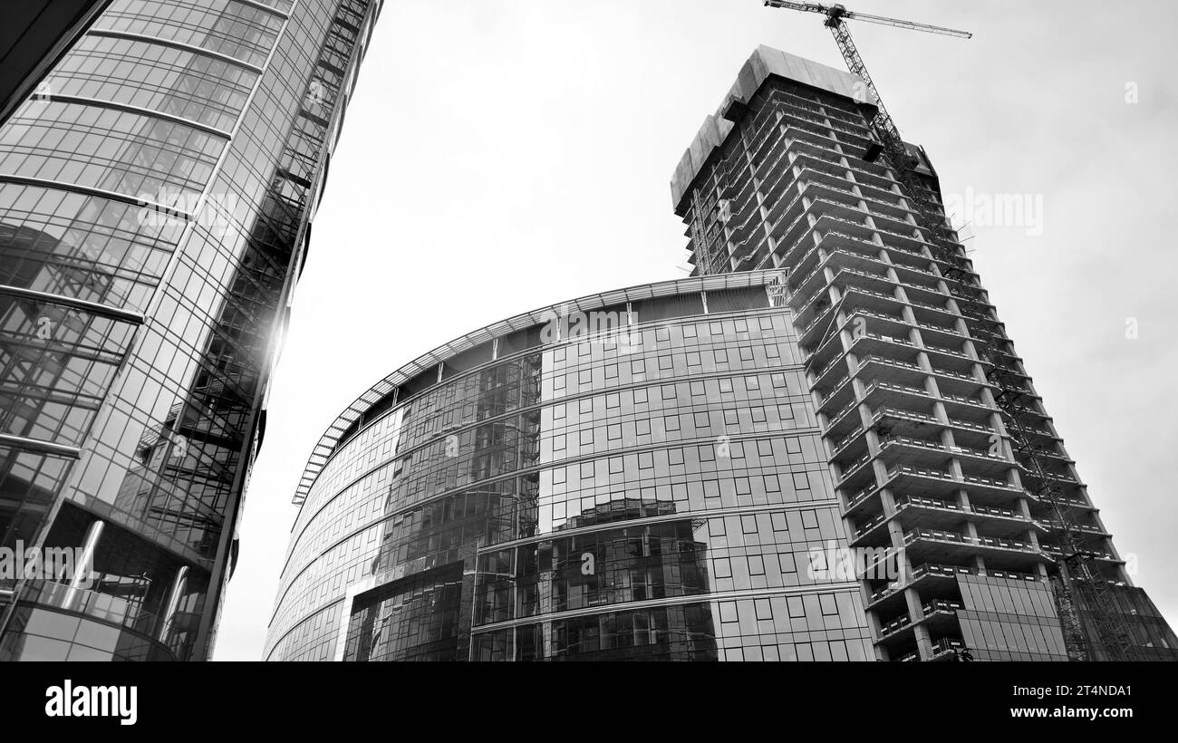View of a skyscraper under construction. Modern architecture background ...
