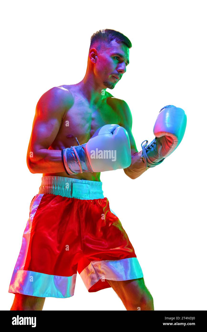Side view portrait of sportsman, boxer, fighter preparing before fight ...