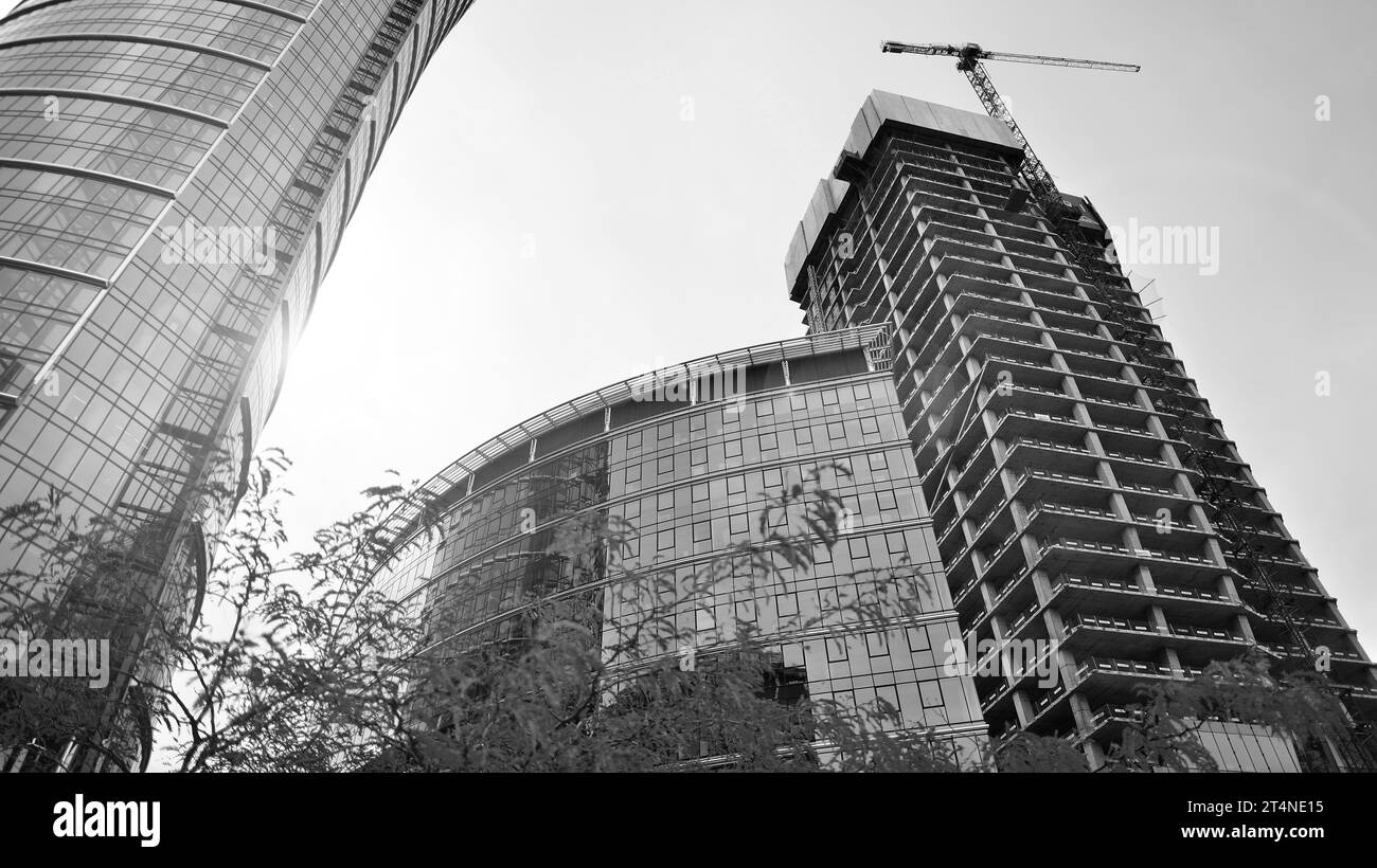 View of a skyscraper under construction. Modern architecture background ...