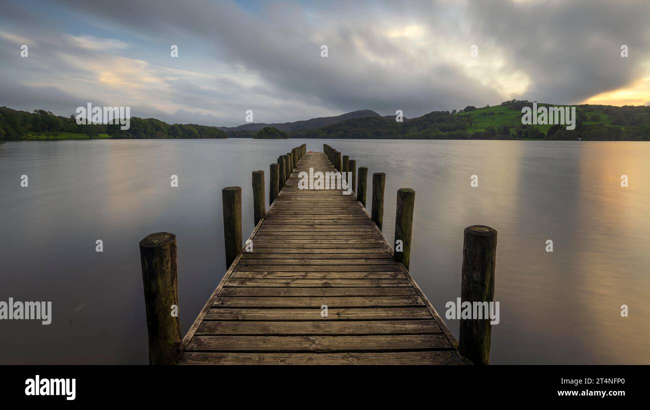 Sunset, Coniston Water, jetty in the water, Lake District National Park ...