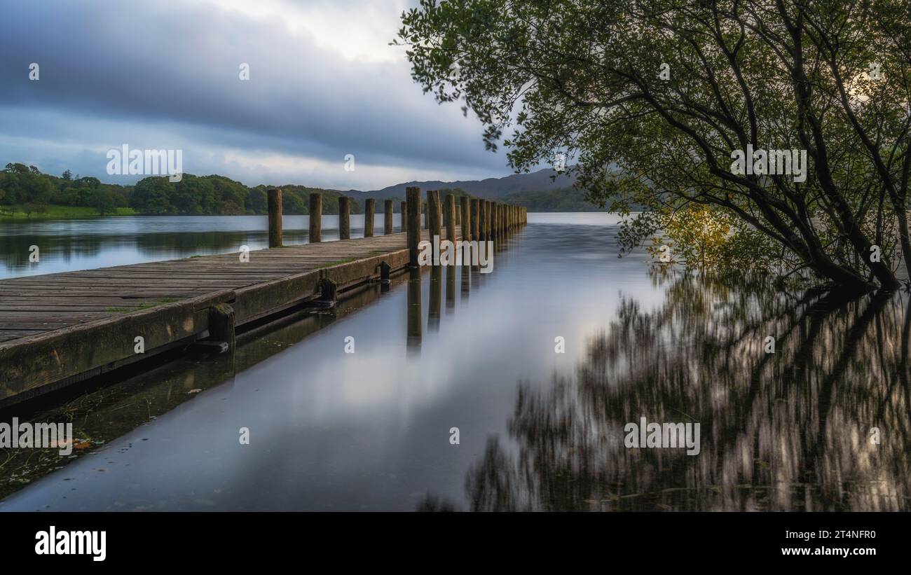 Sunset, Coniston Water, jetty in the water, Lake District National Park ...