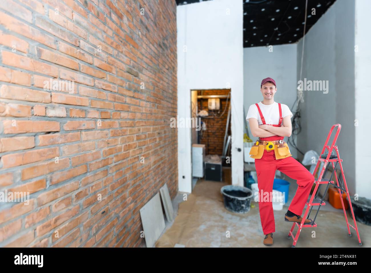 working man is working on repairs Stock Photo - Alamy