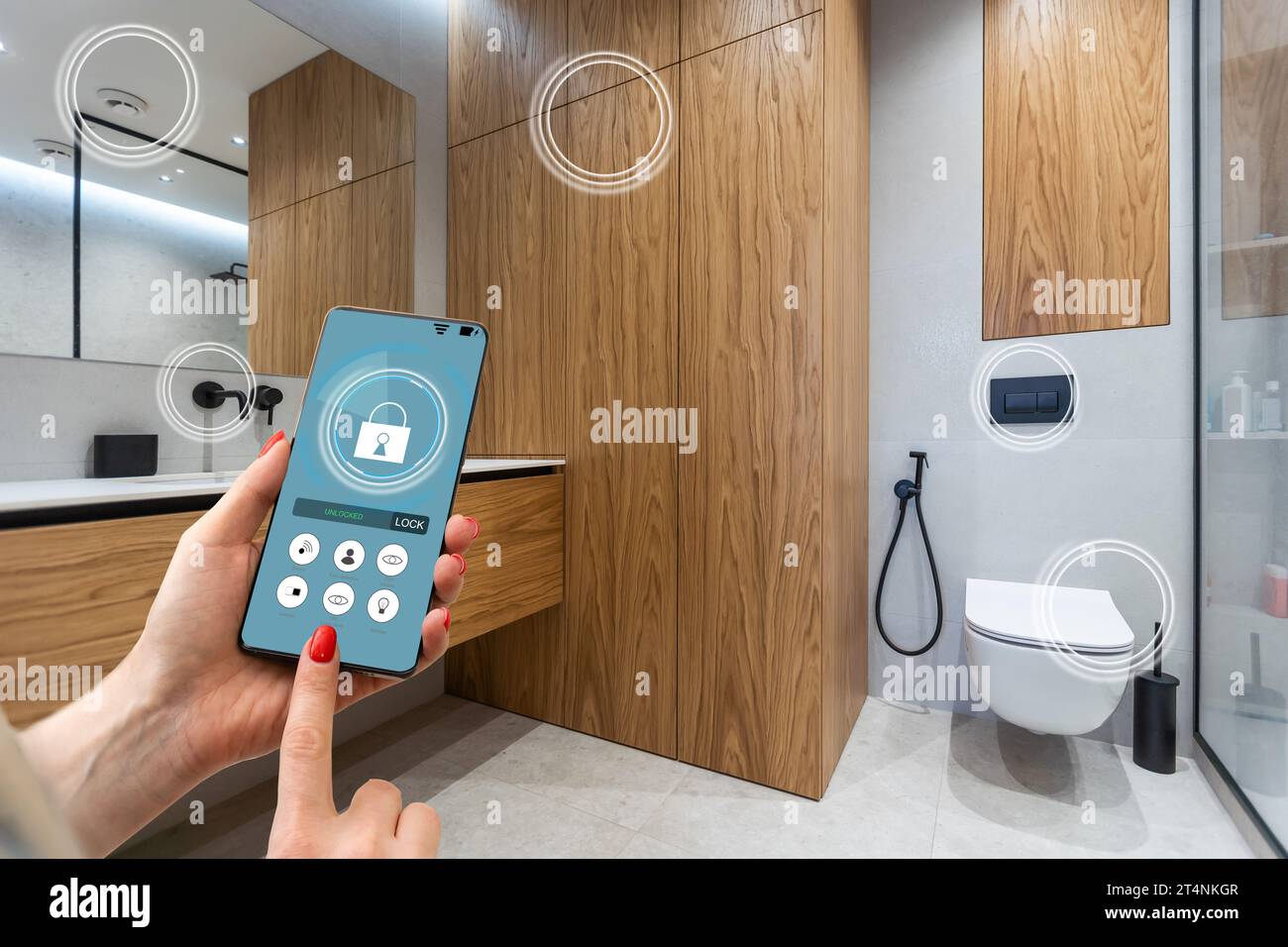 man hand holding phone with app smart home in room house Stock Photo ...