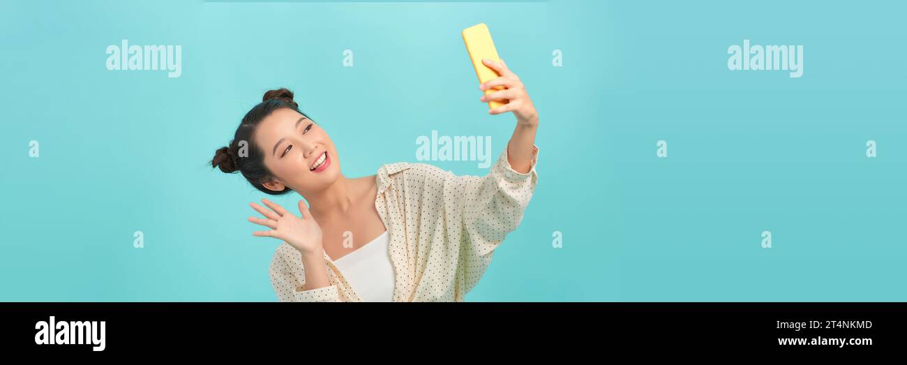 Attractive Happy Positive Woman Has Video Call Chatting Waving Hand At
