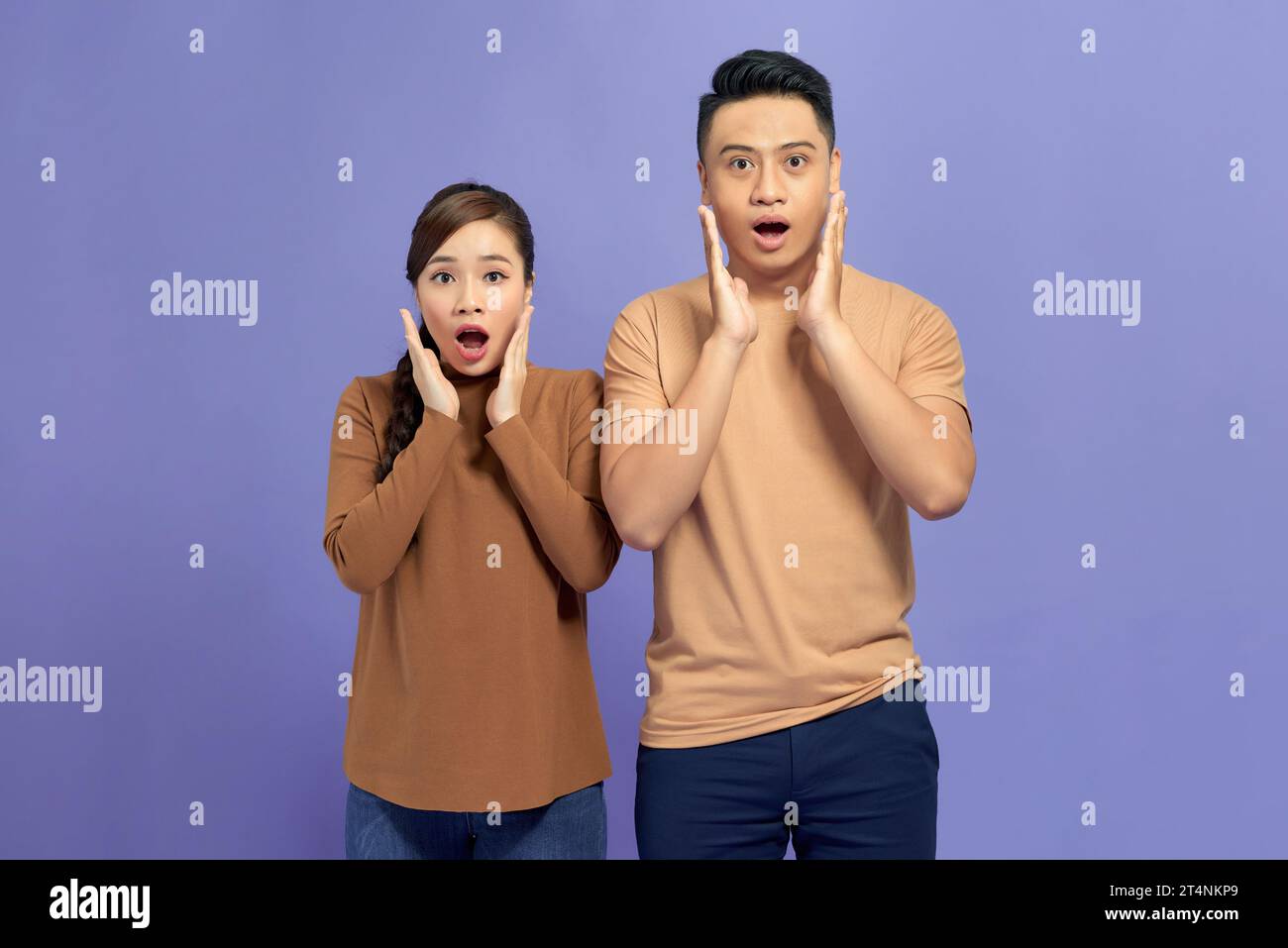 Photo of young cheerful husband wife excited hands touch cheeks good ...