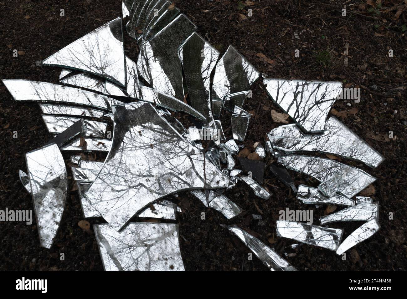 Top view of pile of broken uneven sharp edges of mirror glasses with ...