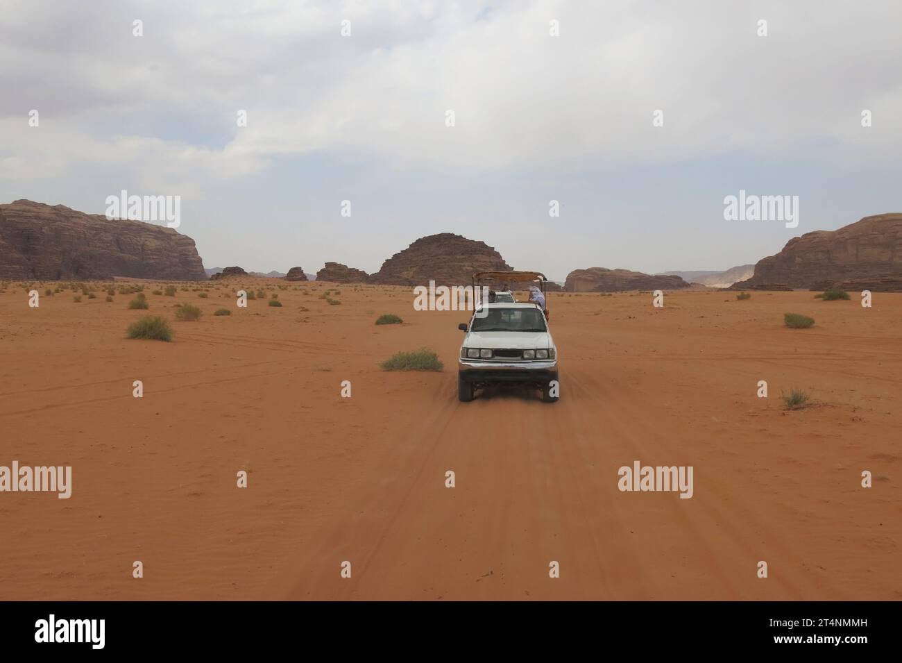 4x4 OffRoad Vans Carrying Passengers and Equipment Across Desert ...
