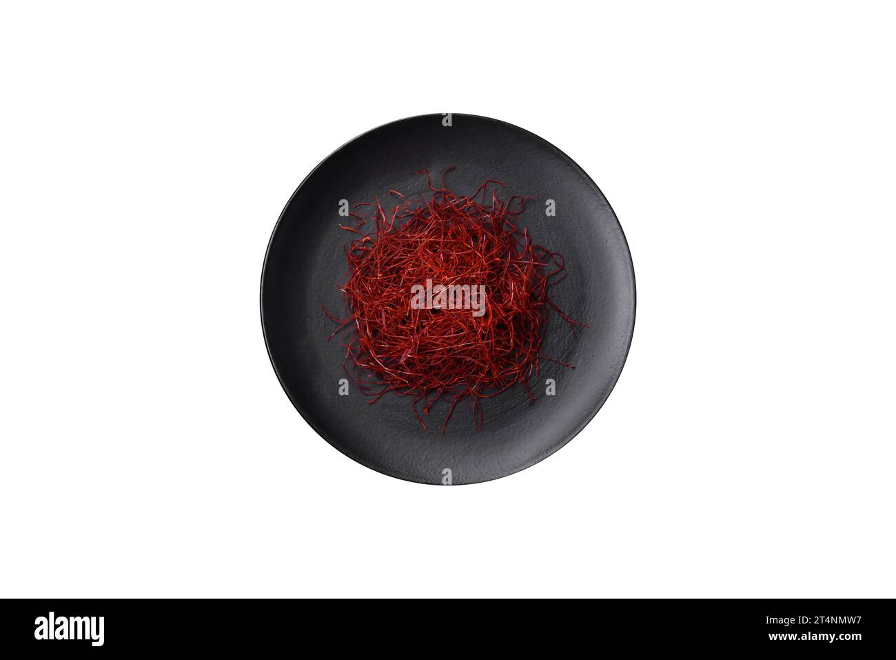 Red thin hot chili threads on a dark background. For decorating Asian ...