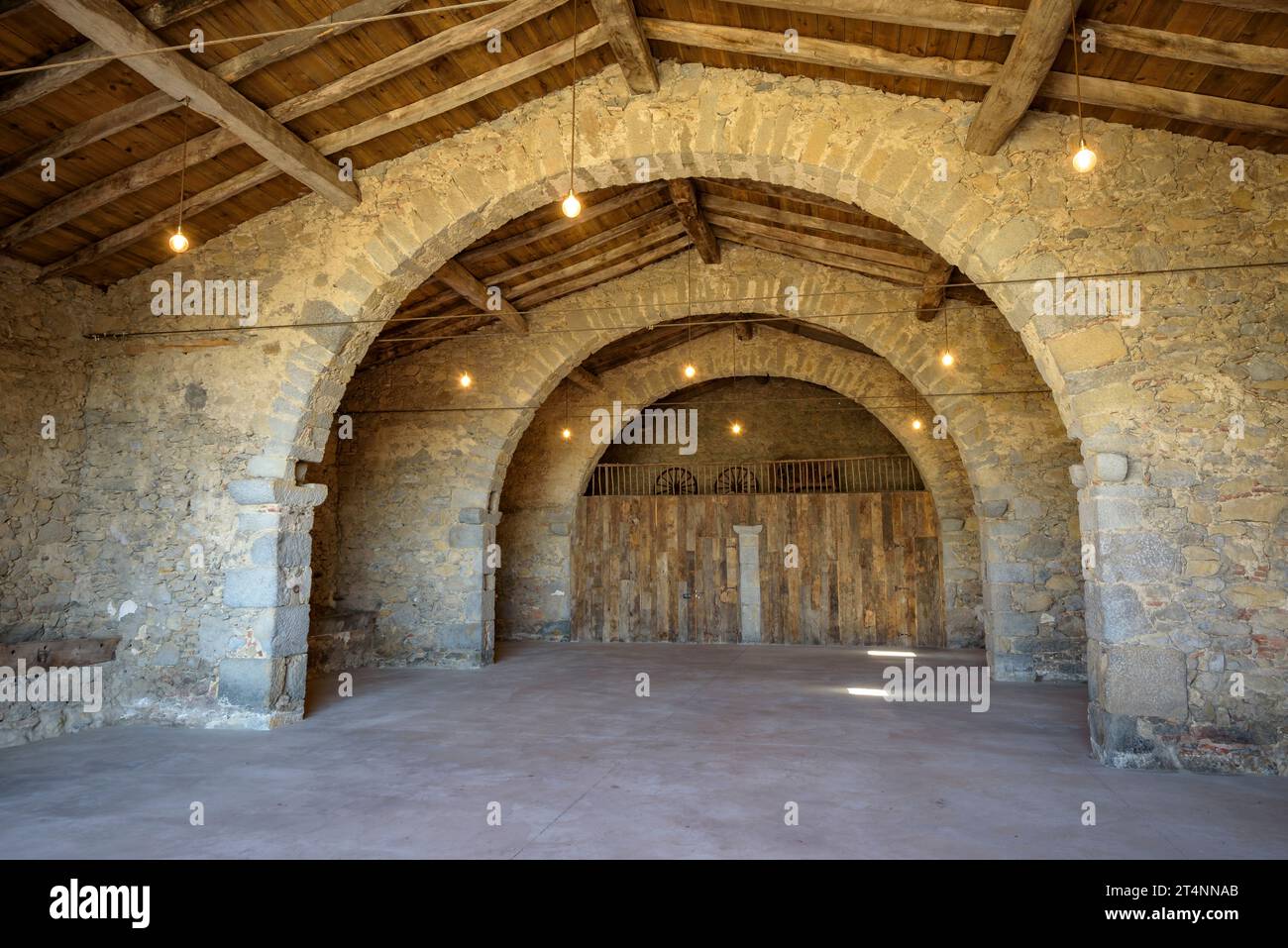 Interior of the reconditioned barn of the Cal Pubill rural country ...