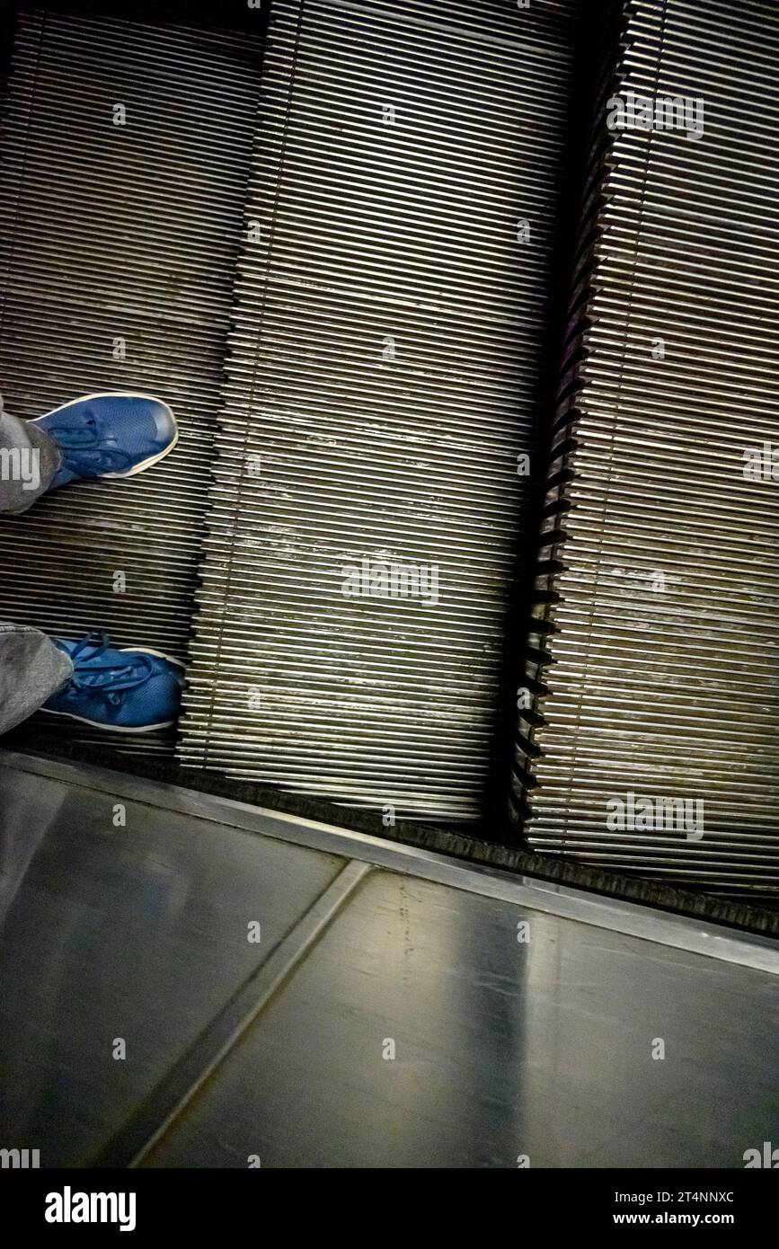 London, UK. Feet on a escalator in an Underground station Stock Photo ...